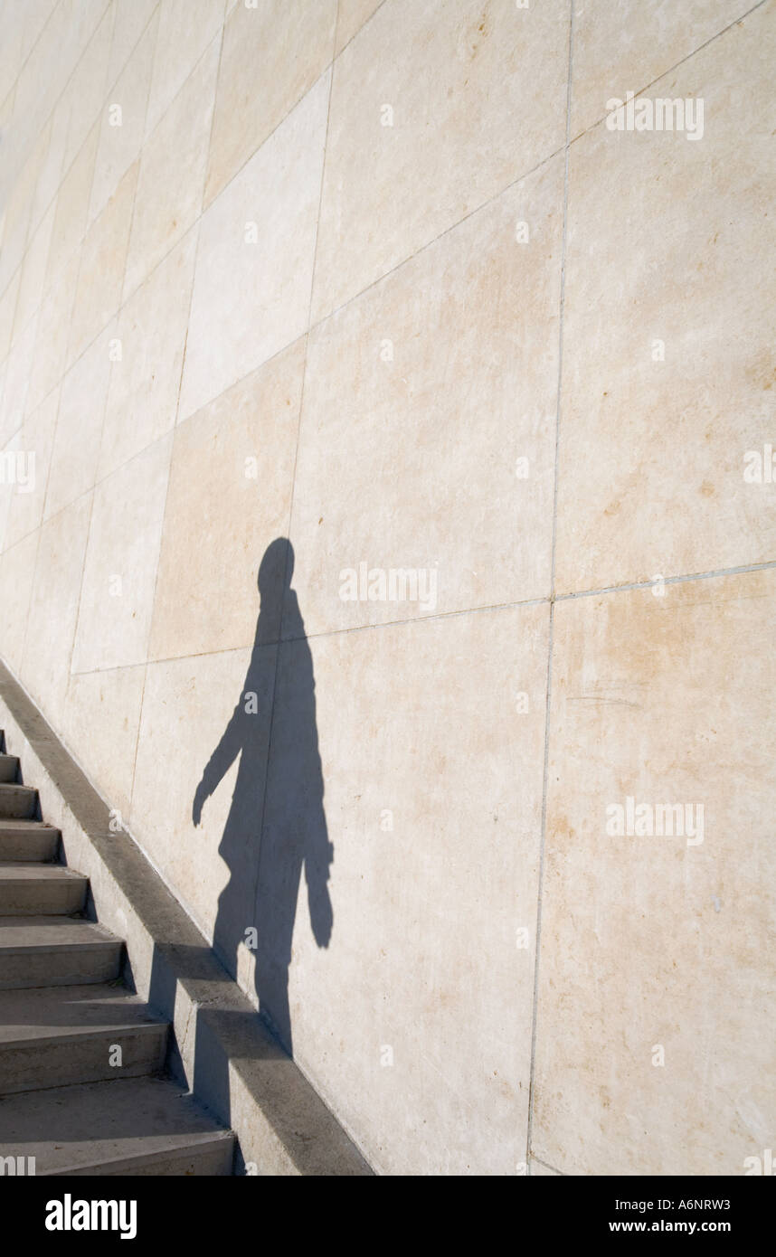 Woman walking up steps in Paris Stock Photo - Alamy