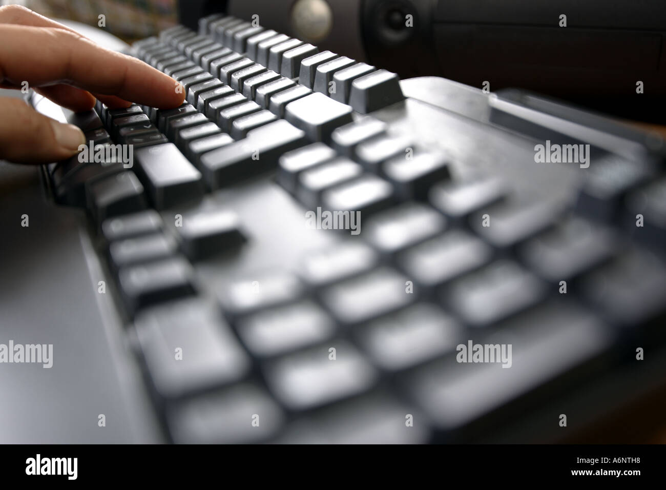 finger on computer keyboard Stock Photo - Alamy