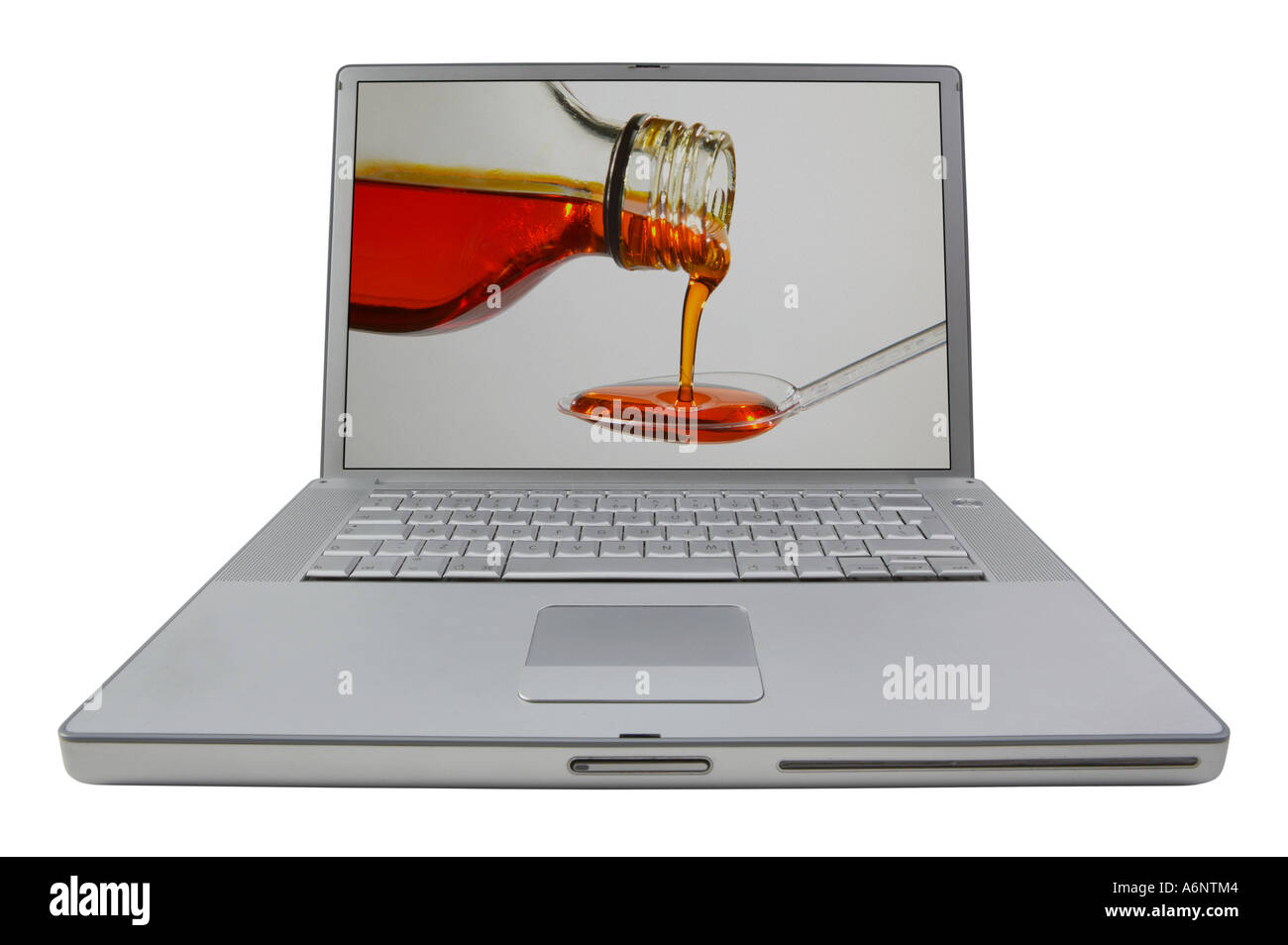 LAP TOP NOTE BOOK COMPUTER DISPLAYING IMAGE OF MEDICINE POURING FROM ...
