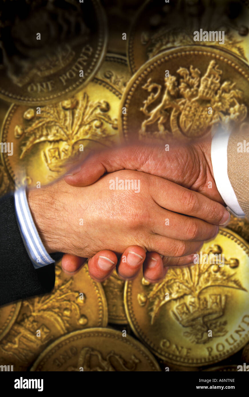 Handshake Pound Coins High Resolution Stock Photography and Images - Alamy