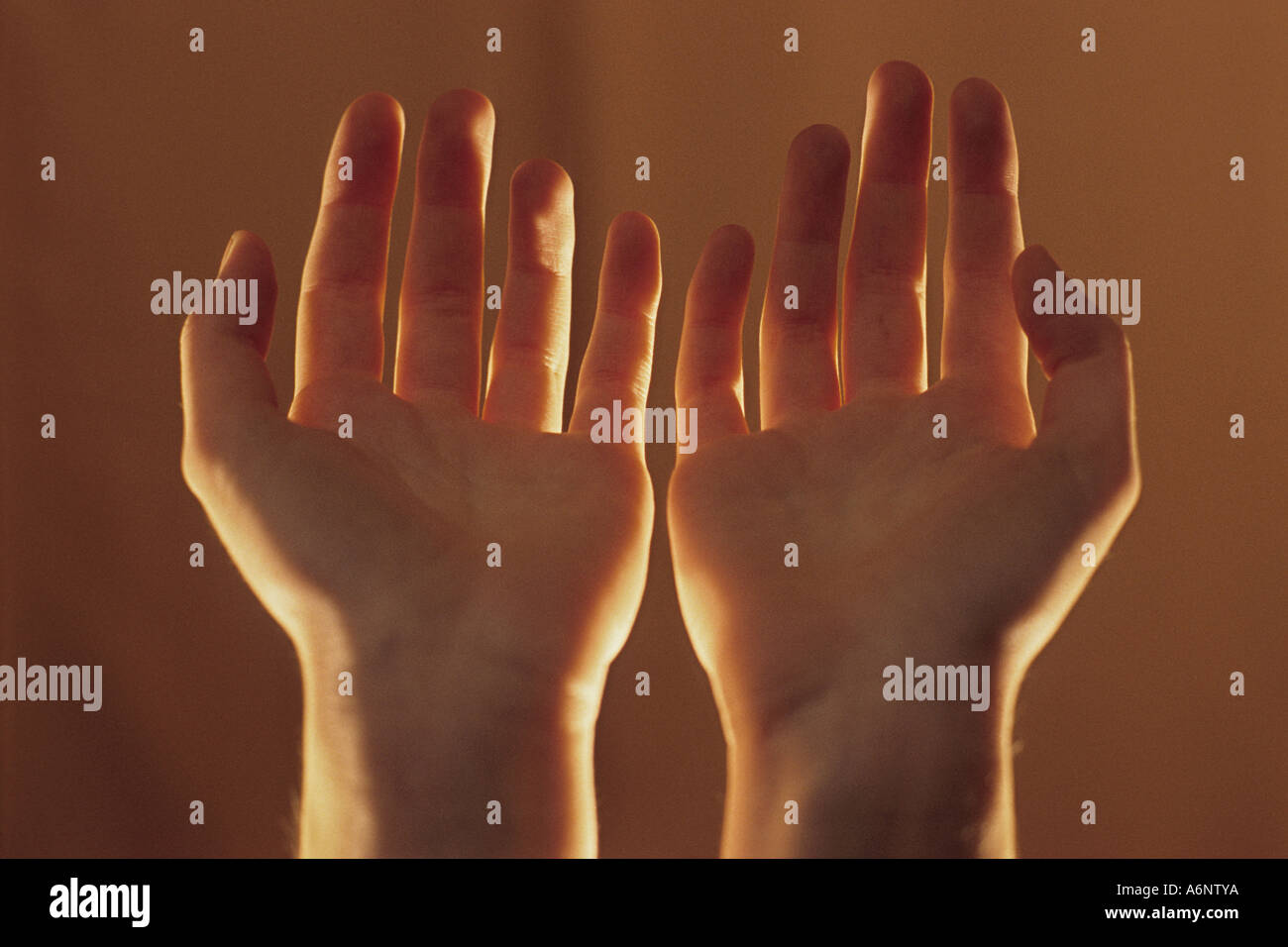 Stretched out hands Stock Photo - Alamy