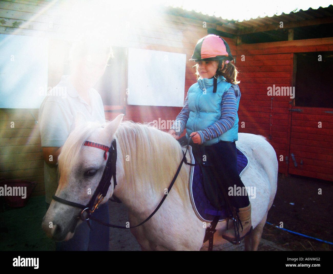 Pony riding lesson hi-res stock photography and images - Alamy