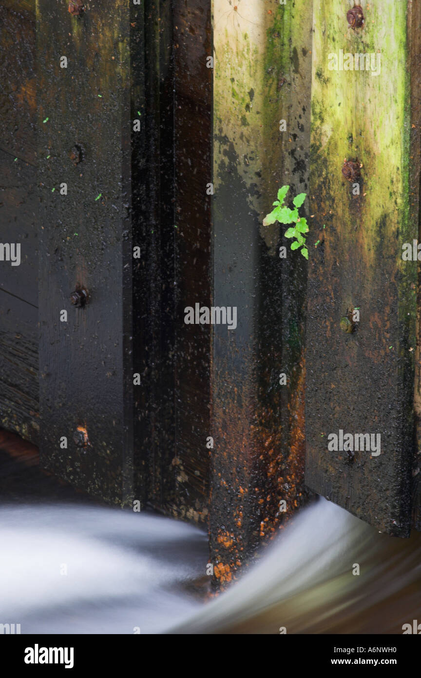 Water passing sluice Stock Photo - Alamy