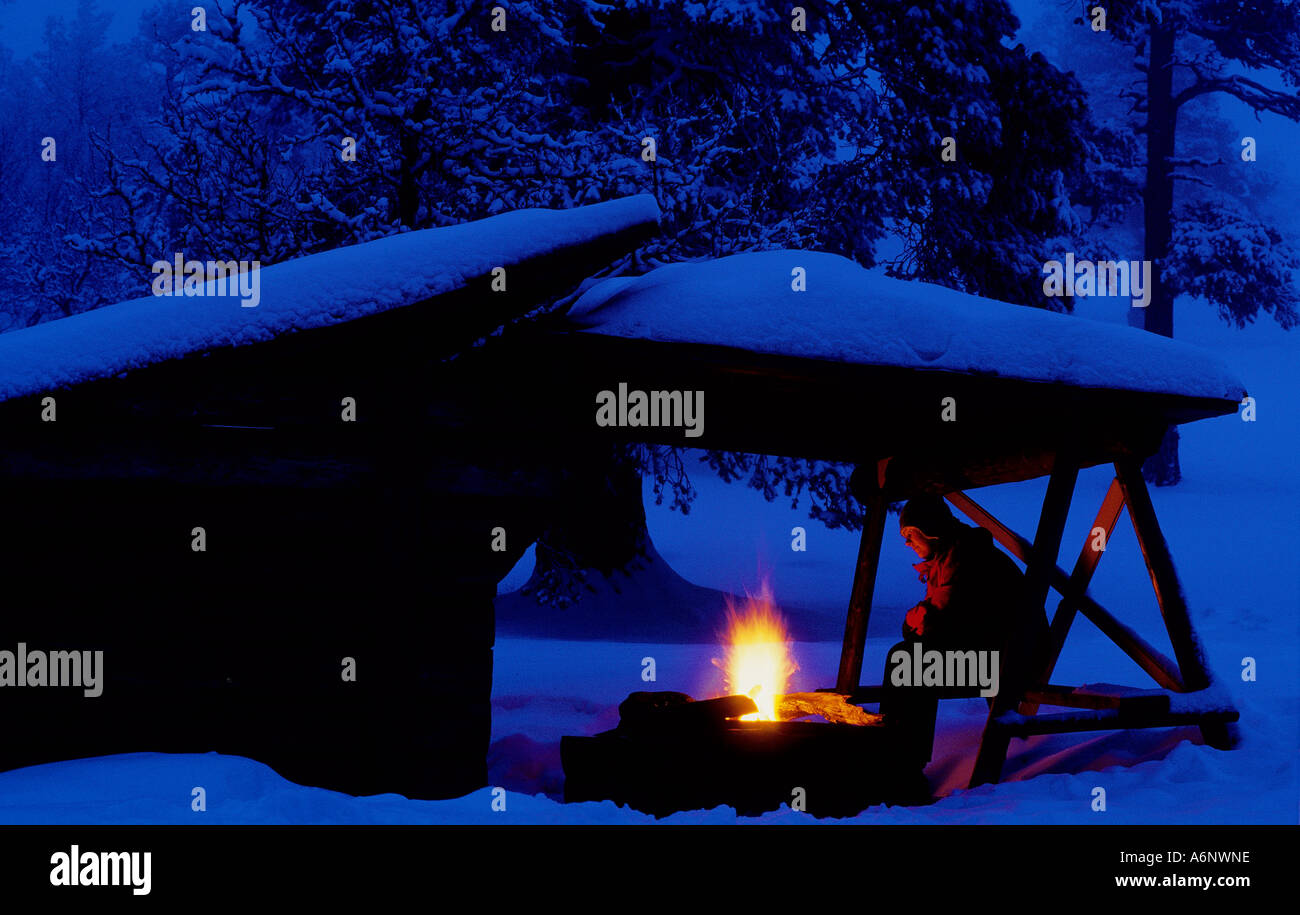 Camp fire at wooden shelter. Dalarna, Sweden Stock Photo - Alamy
