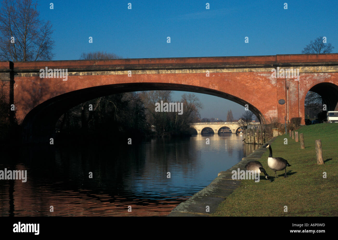 Road toll bridge and Brunel's railway bridge over River Thames ...