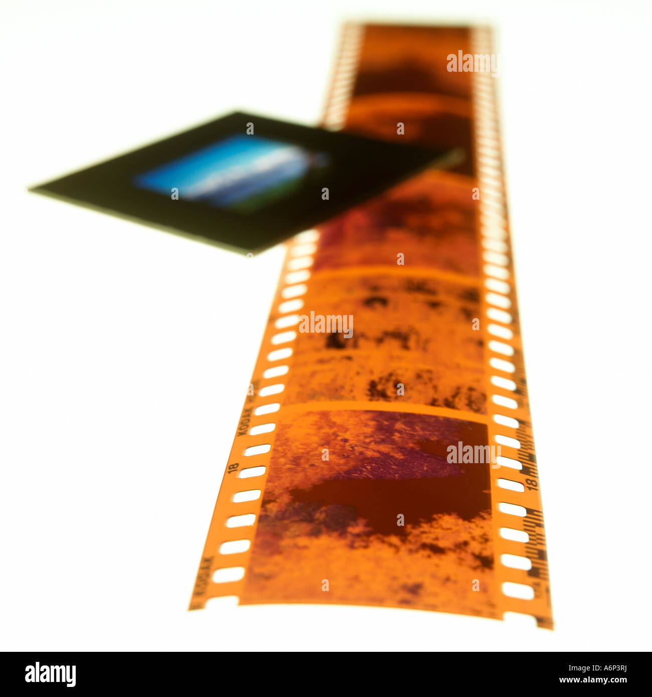 old photo technology, negatives and a slide-transparency on a lightbox ...