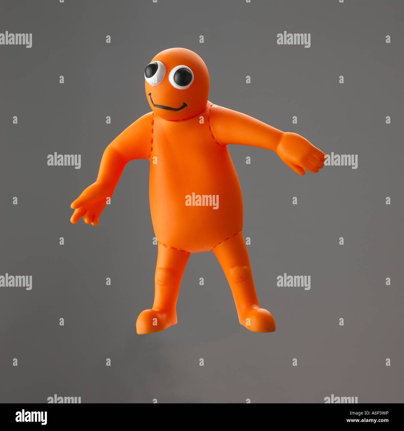 orange tango man floating on a grey background Stock Photo - Alamy