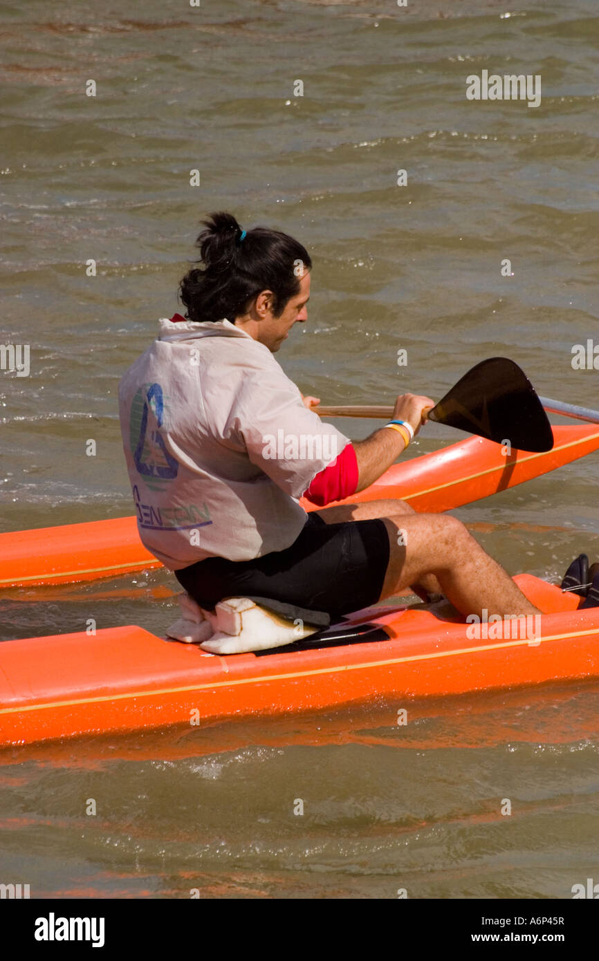 Man on outrigger canoe in Somme estuary French France St Valery Somme ...