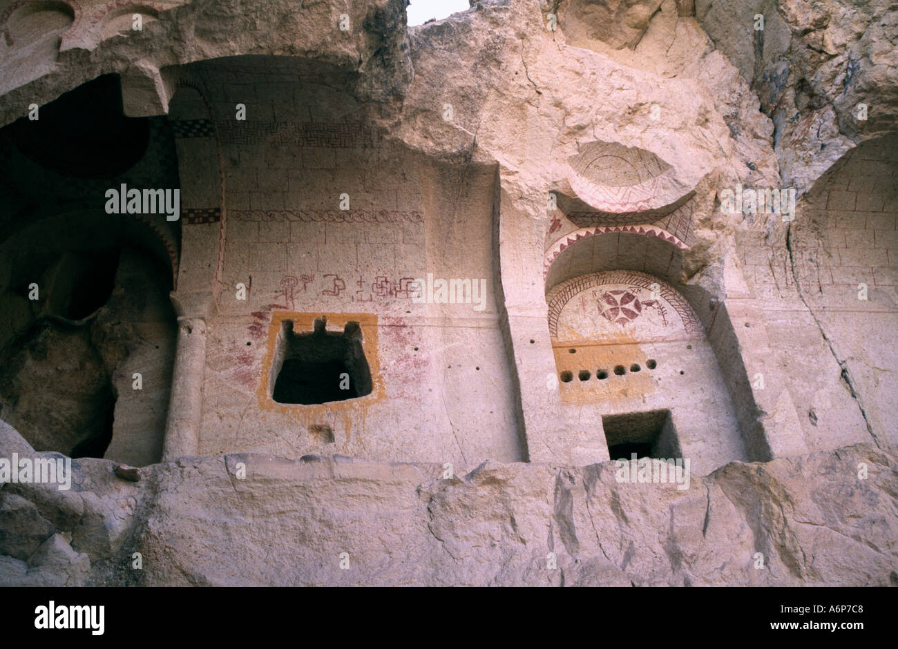 A rock cut church with painted decoration at Goreme Open Air Museum in ...