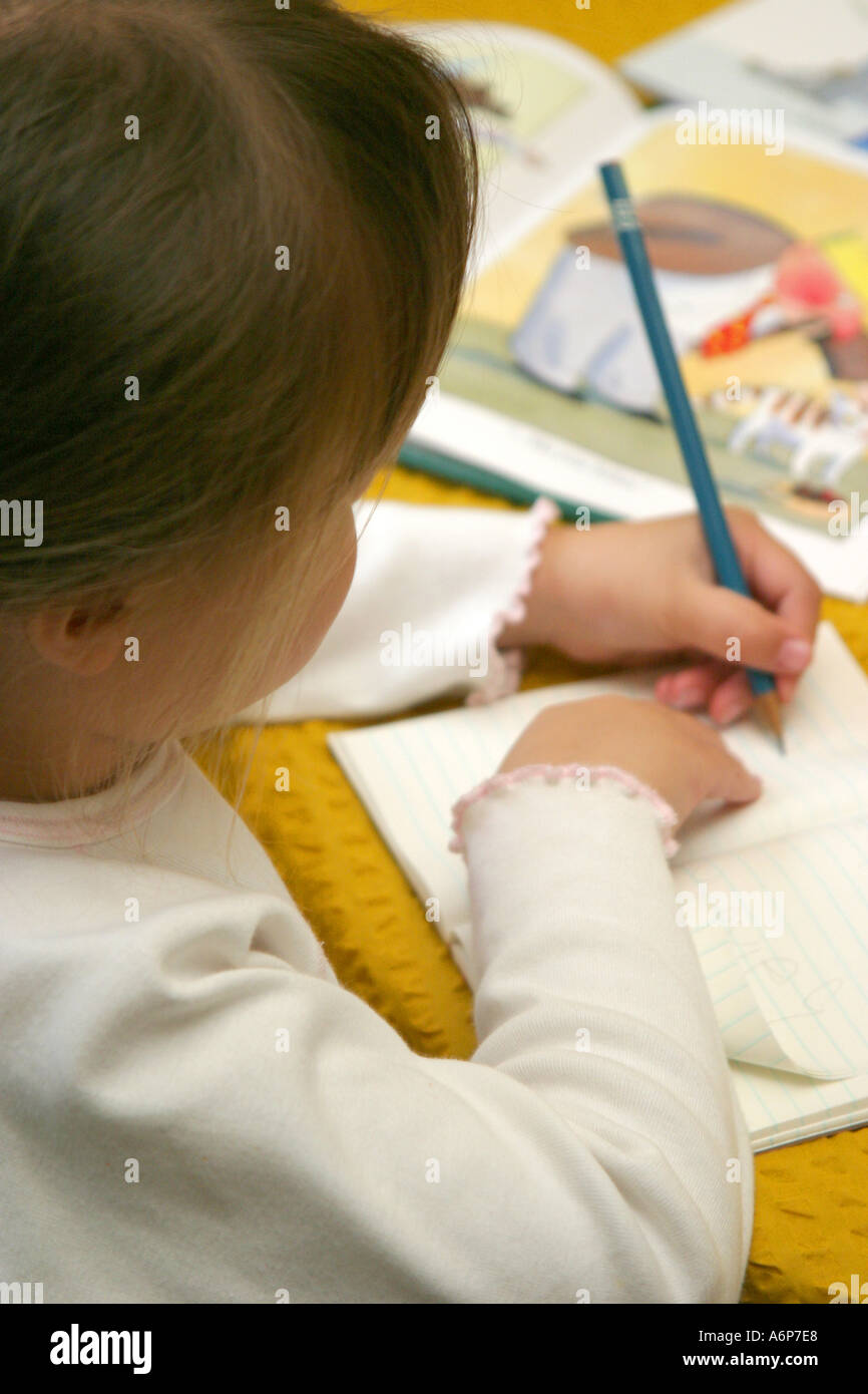 young girl doing homework Stock Photo - Alamy
