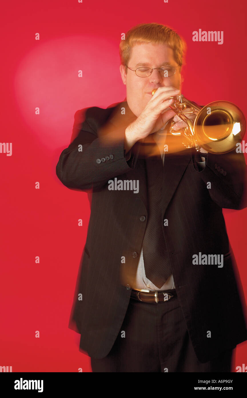 Professional trumpet player swings his horn Stock Photo - Alamy