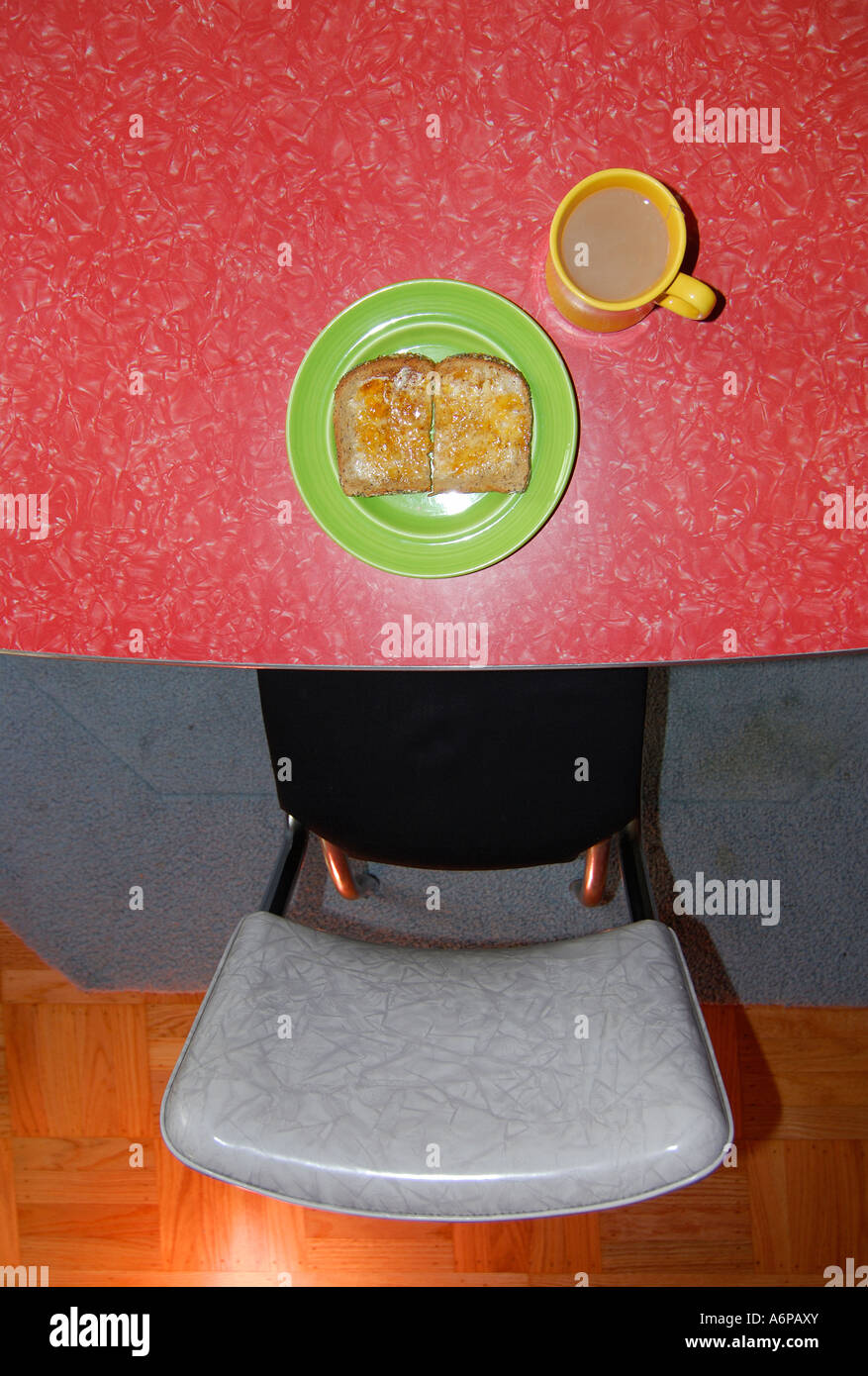 "Breakfast alone, tea and toast Stock Photo - Alamy