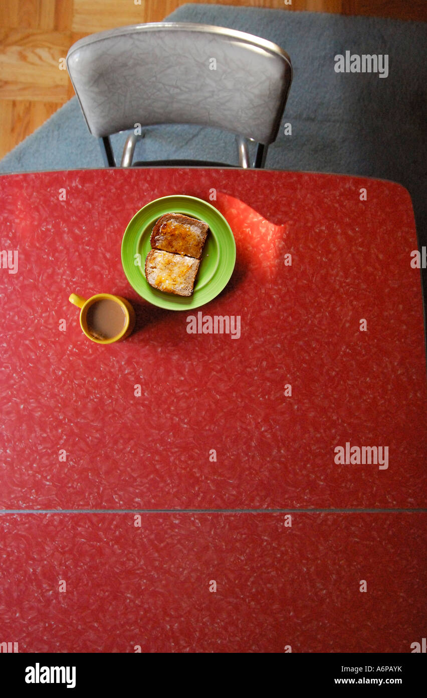 "Breakfast alone, tea and toast Stock Photo - Alamy