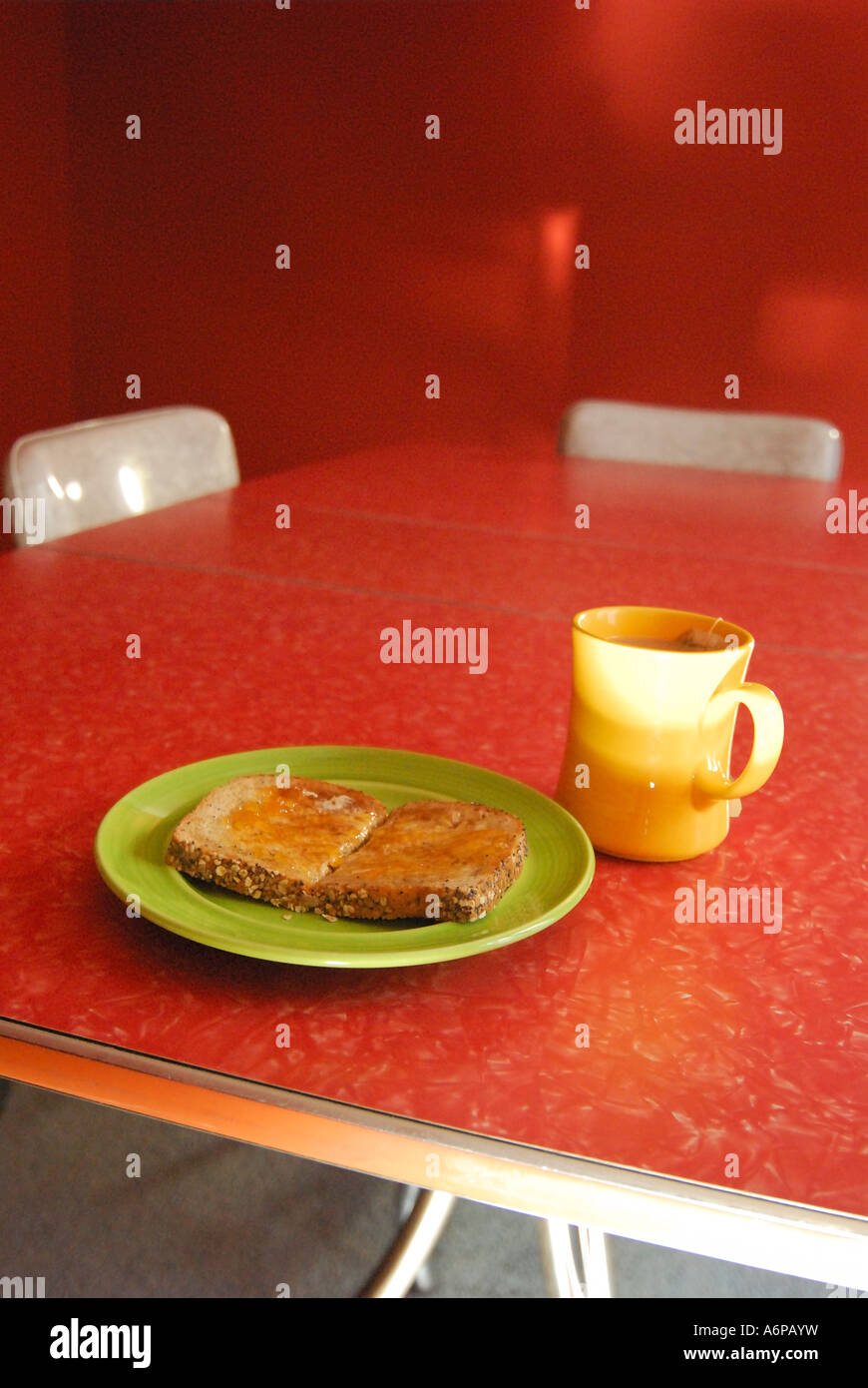 "Breakfast alone, tea and toast Stock Photo - Alamy