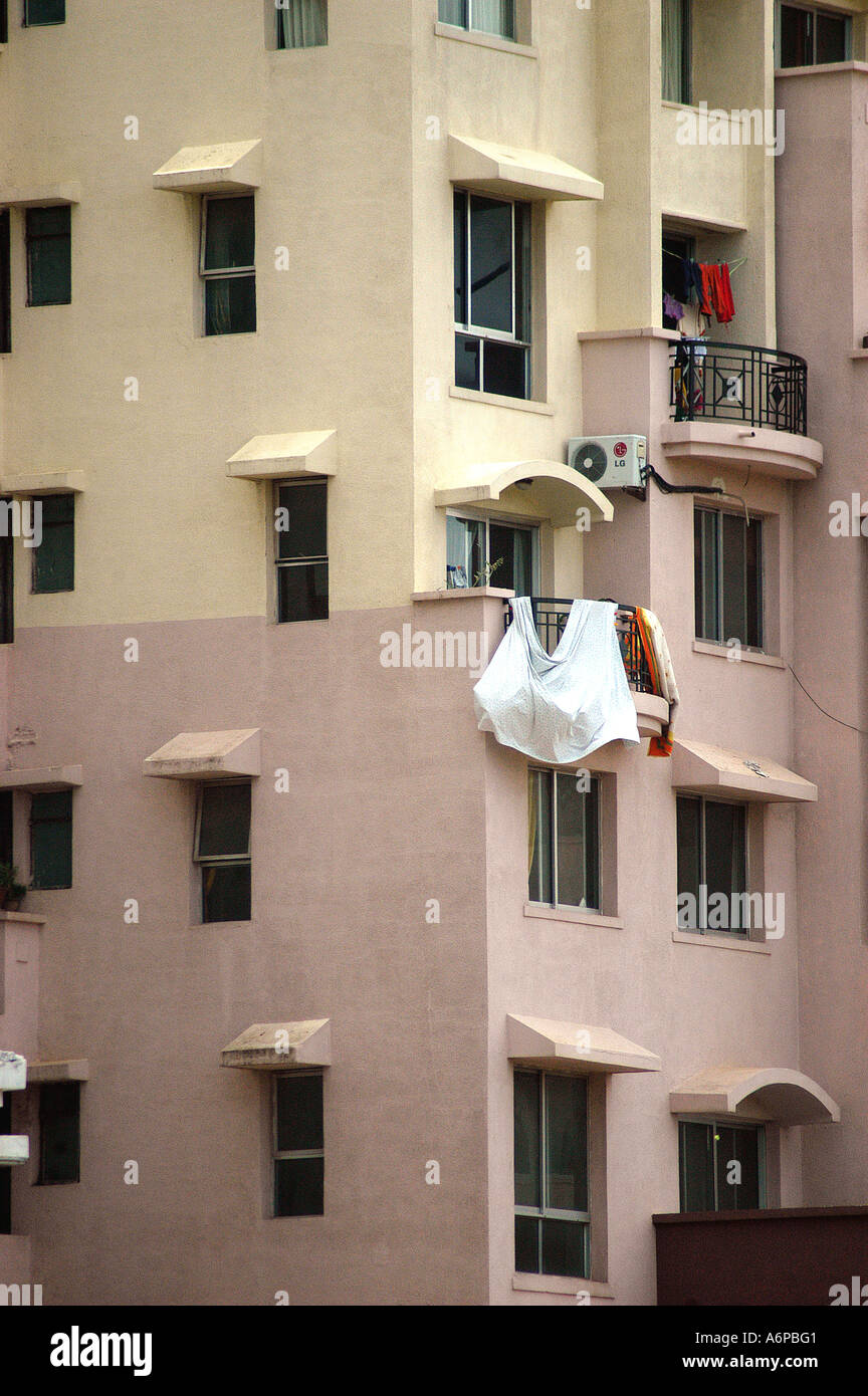 clothes drying in balcony of modern multi storied residential complex ...