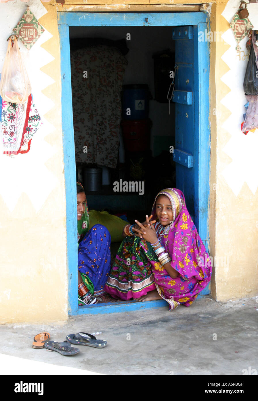 Vividly colorful traditional dress of a Tribal women in a Banni Village ...