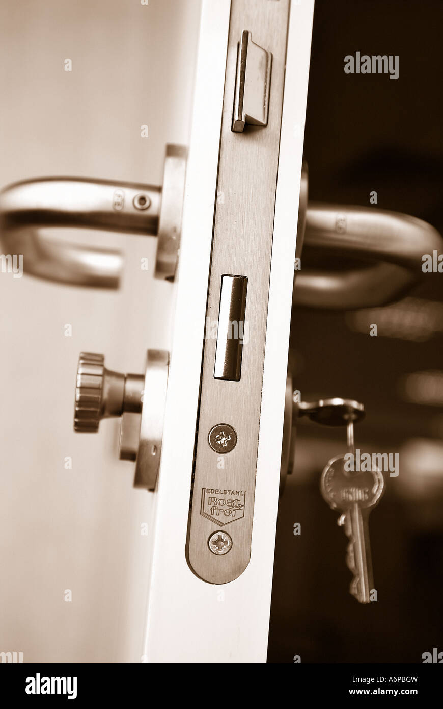 door handle with keys in lock Stock Photo - Alamy