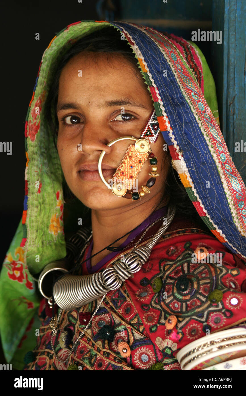 Vividly colorful traditional dress of a Tribal woman in a Banni Village ...