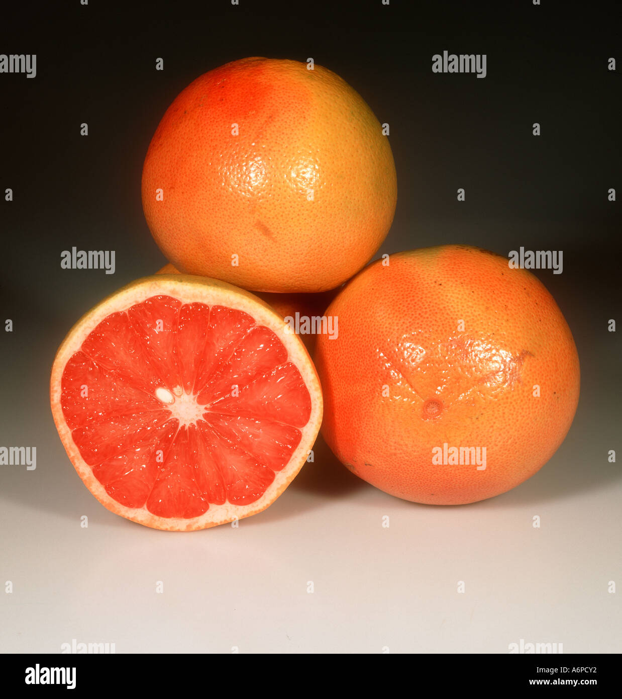 Group of grapefruit fruits variety Red Rio one sectioned Stock Photo ...