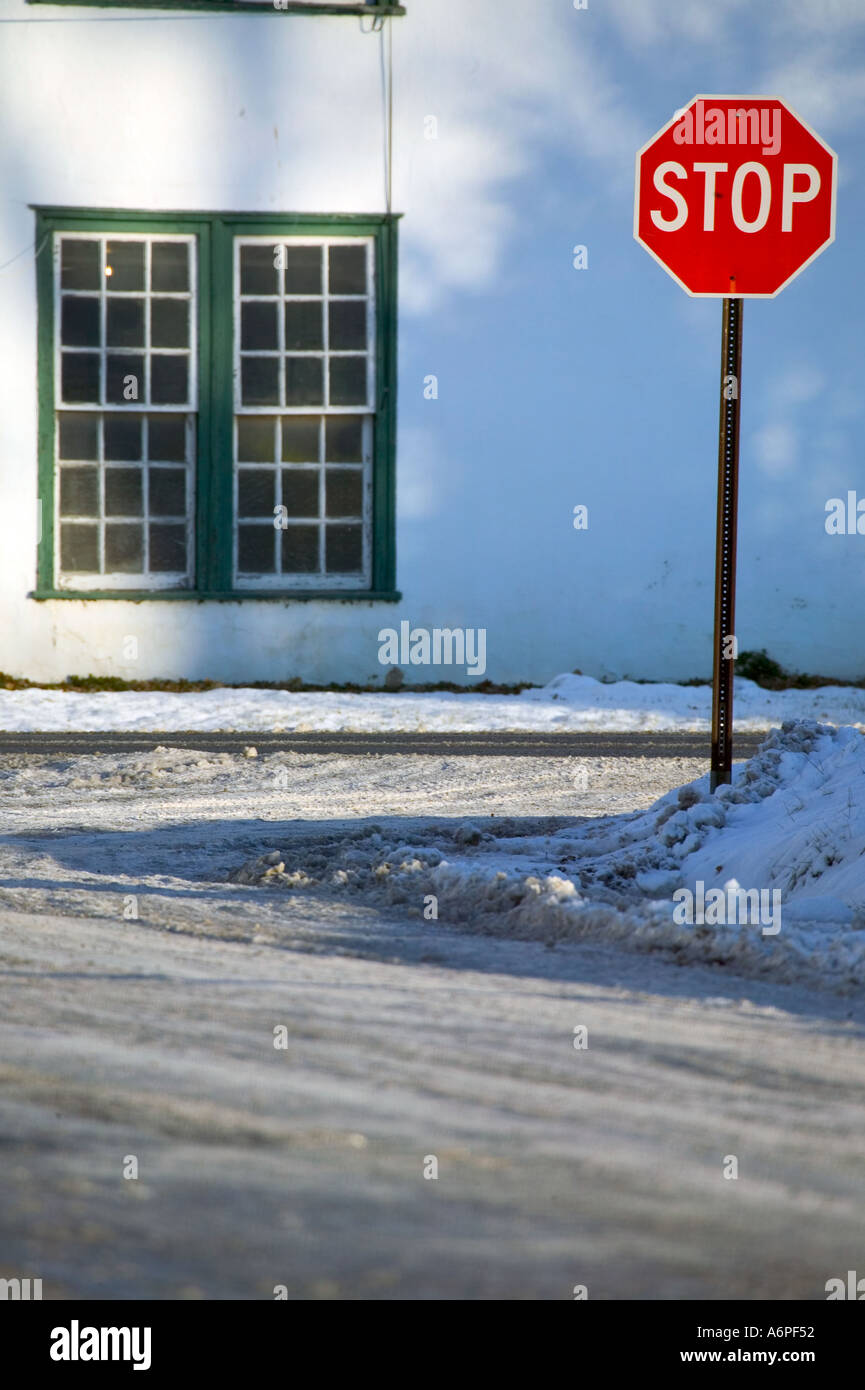 A stop sign warns motorists of the dead end before they hit a building ...