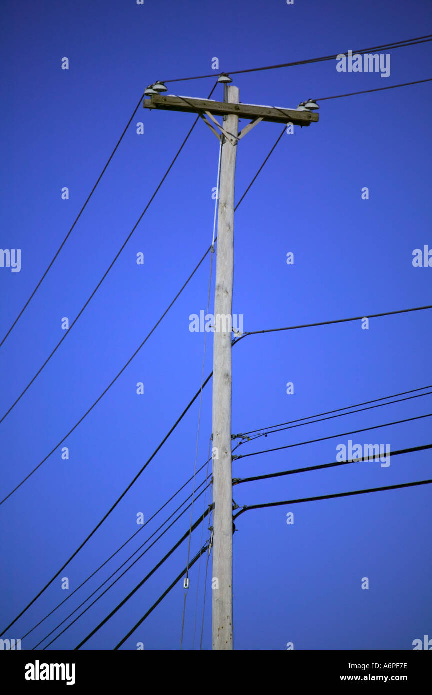 A telephone and electric line utility pole Stock Photo - Alamy