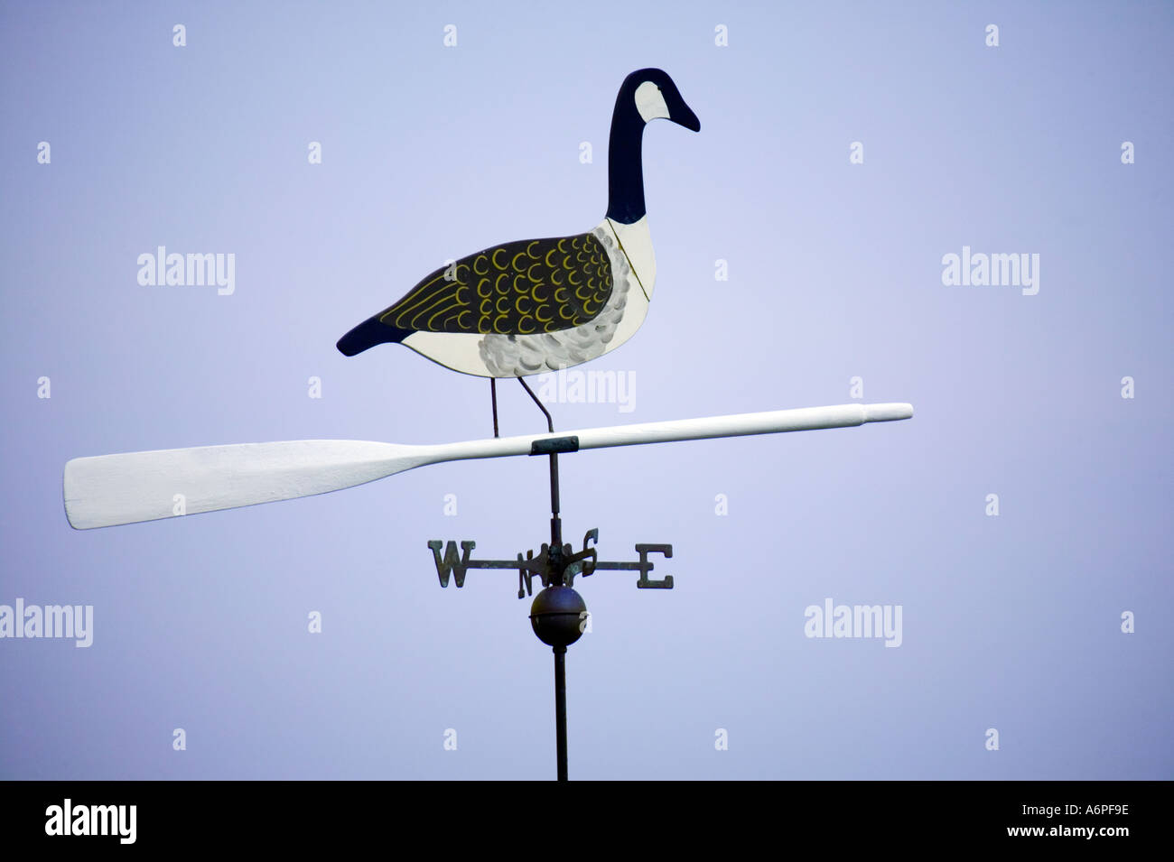 A directional wind vane atop a building Stock Photo - Alamy