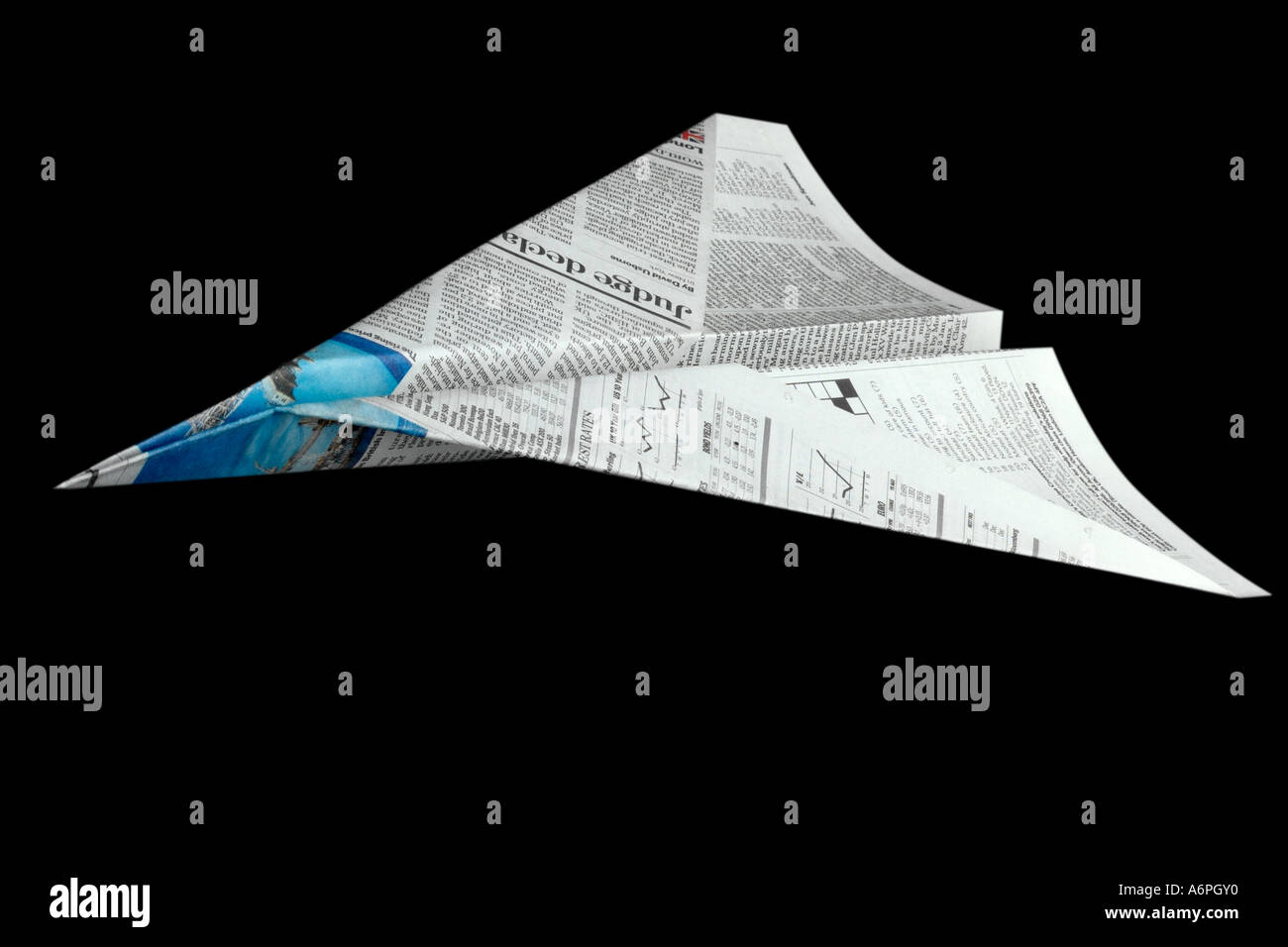 A person throwing a Paper airplane made from newspaper Stock Photo - Alamy