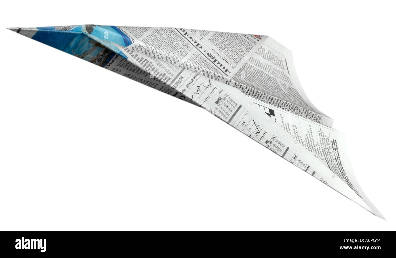A person throwing a Paper airplane made from newspaper Stock Photo - Alamy