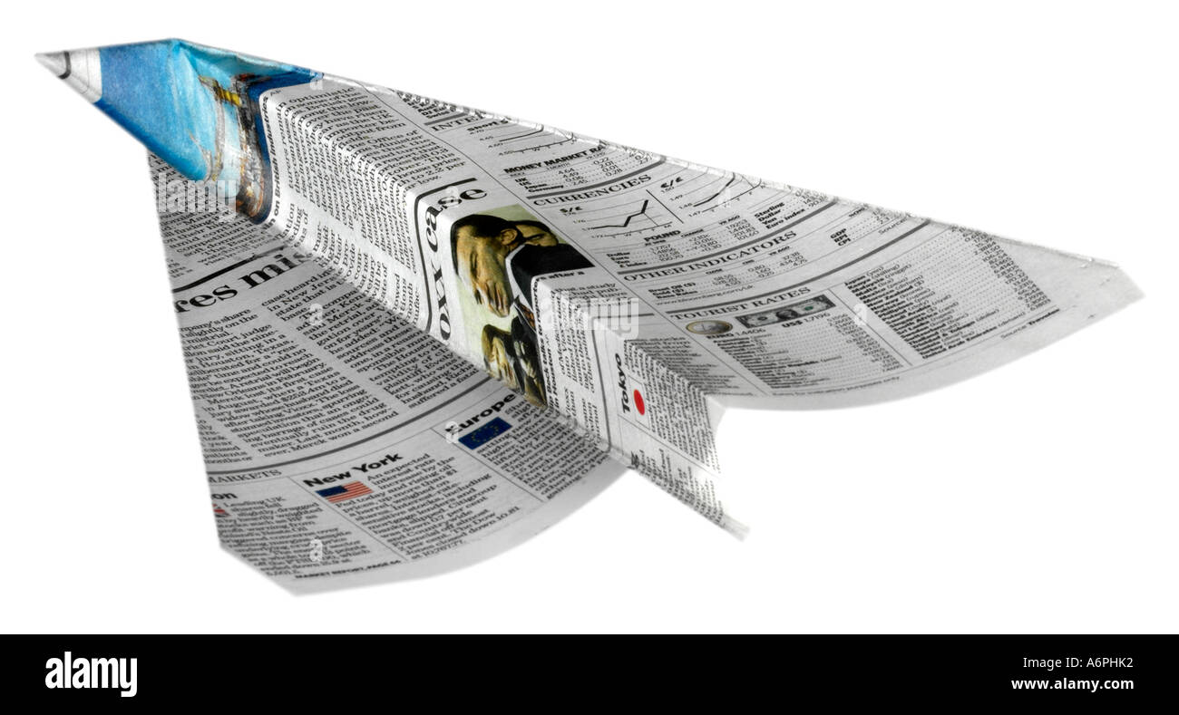 A person throwing a Paper airplane made from newspaper Stock Photo - Alamy