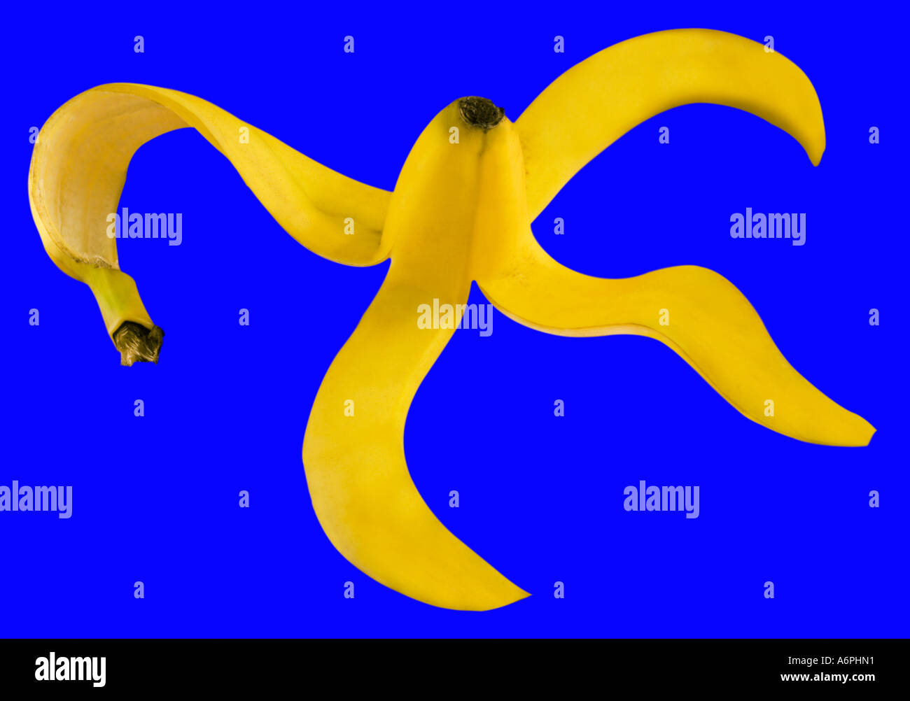 BANANA SKIN ON BLUE BACKGROUND Stock Photo - Alamy