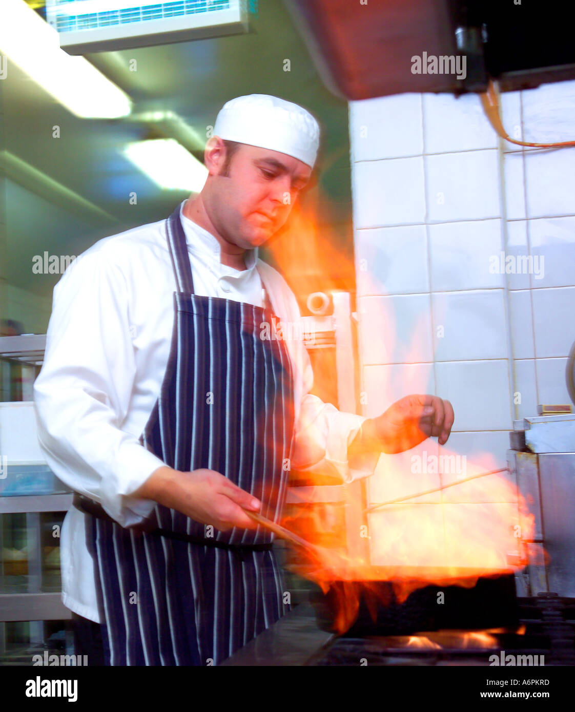 ONE PROFESSIONAL CHEF WORKING IN COMMERCIAL KITCHEN Stock Photo - Alamy