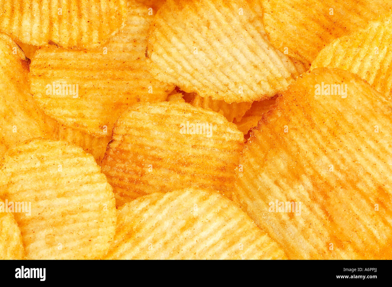 Flakes of crisps as background Stock Photo - Alamy