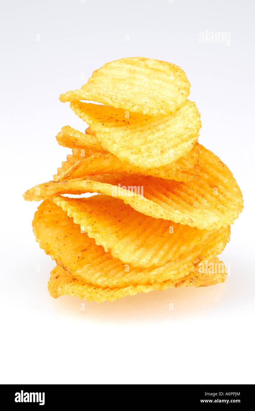 Stack of crisps on white background Stock Photo - Alamy