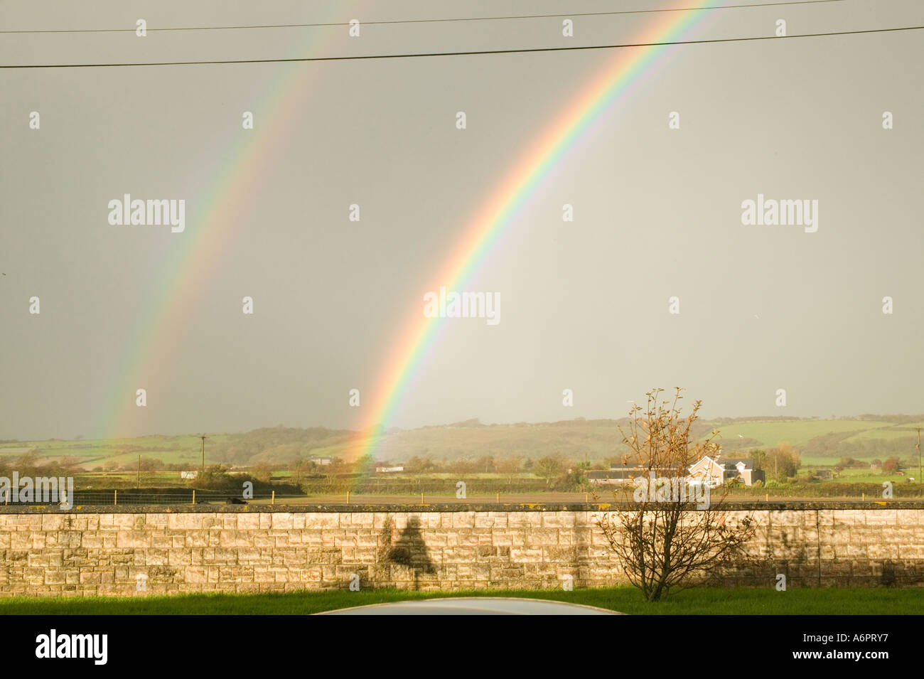 double rainbow relationship two twin side by side Stock Photo - Alamy
