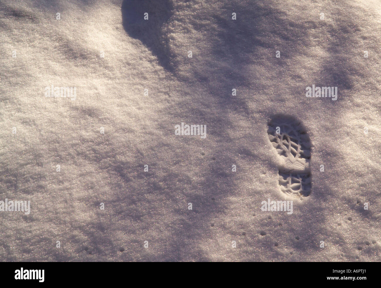 Footprint in Snow Stock Photo - Alamy