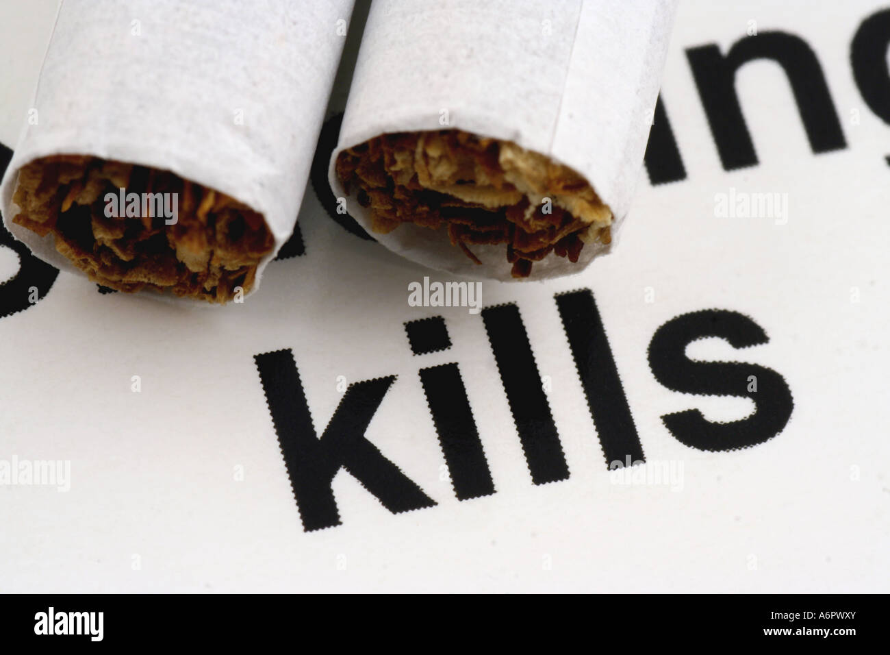 Cigarettes and packet health warning Stock Photo - Alamy