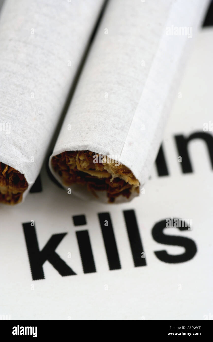 Cigarettes and health warning Stock Photo - Alamy