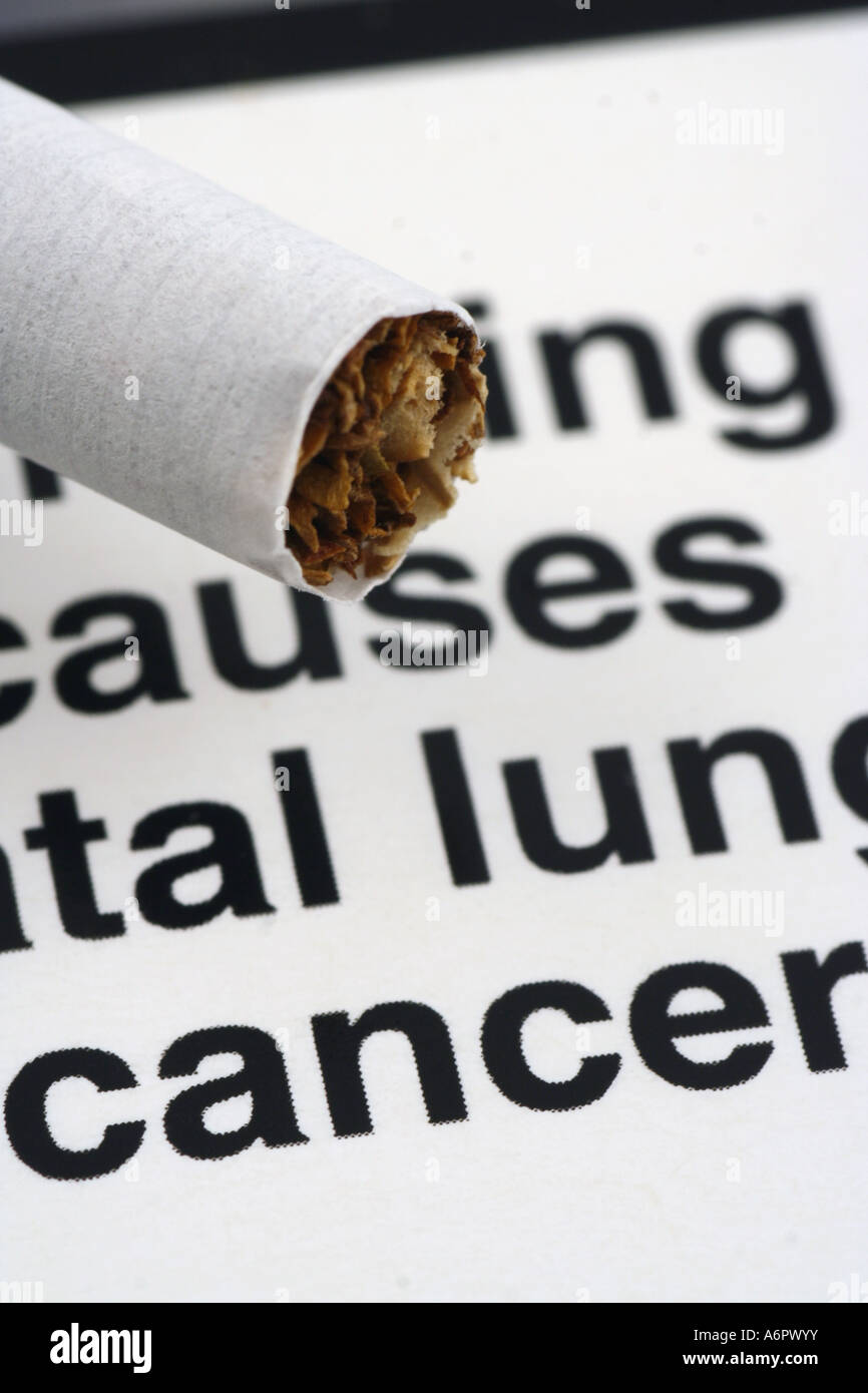 Cigarette and health warning Stock Photo - Alamy