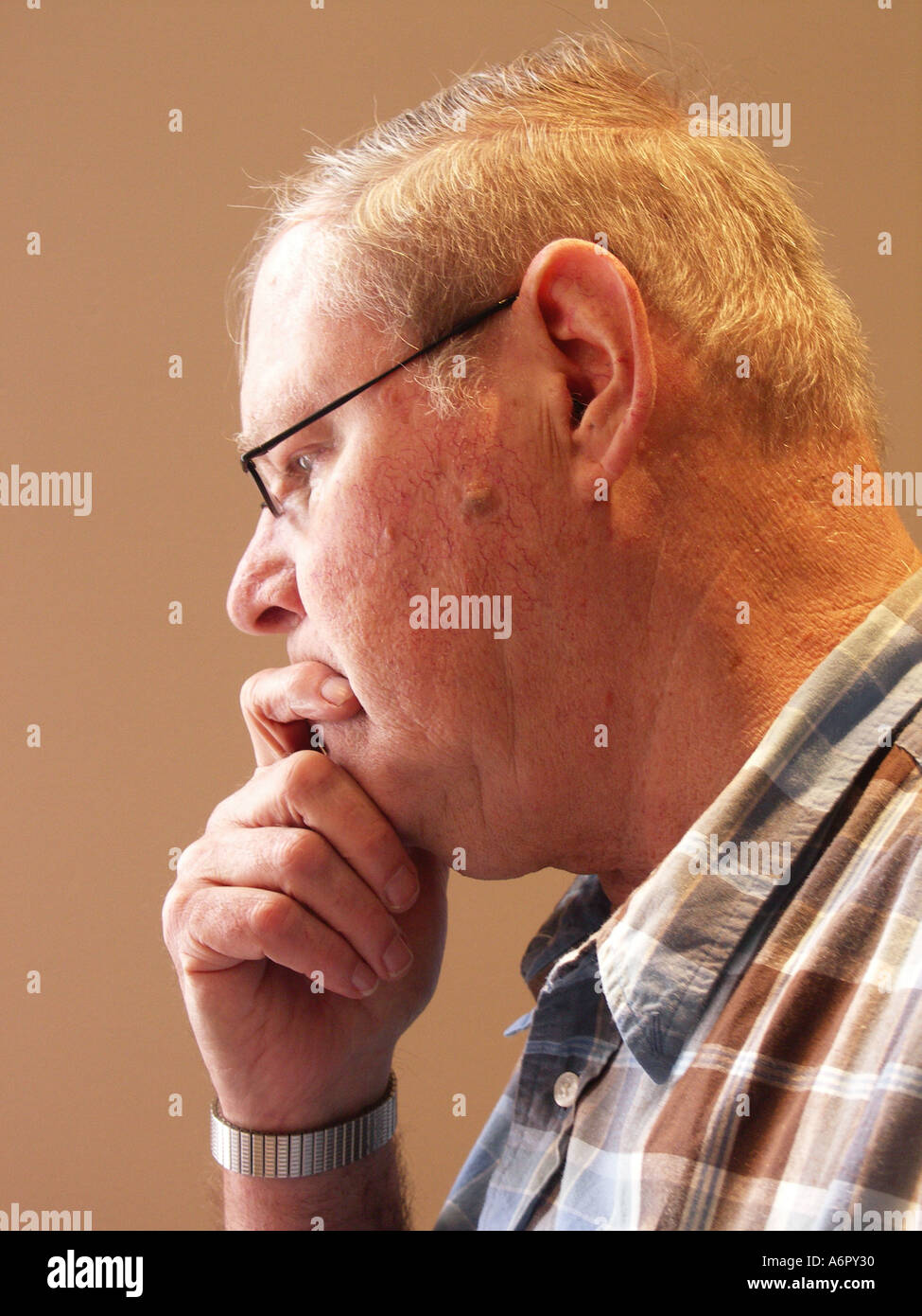 Worried man thinking Stock Photo - Alamy
