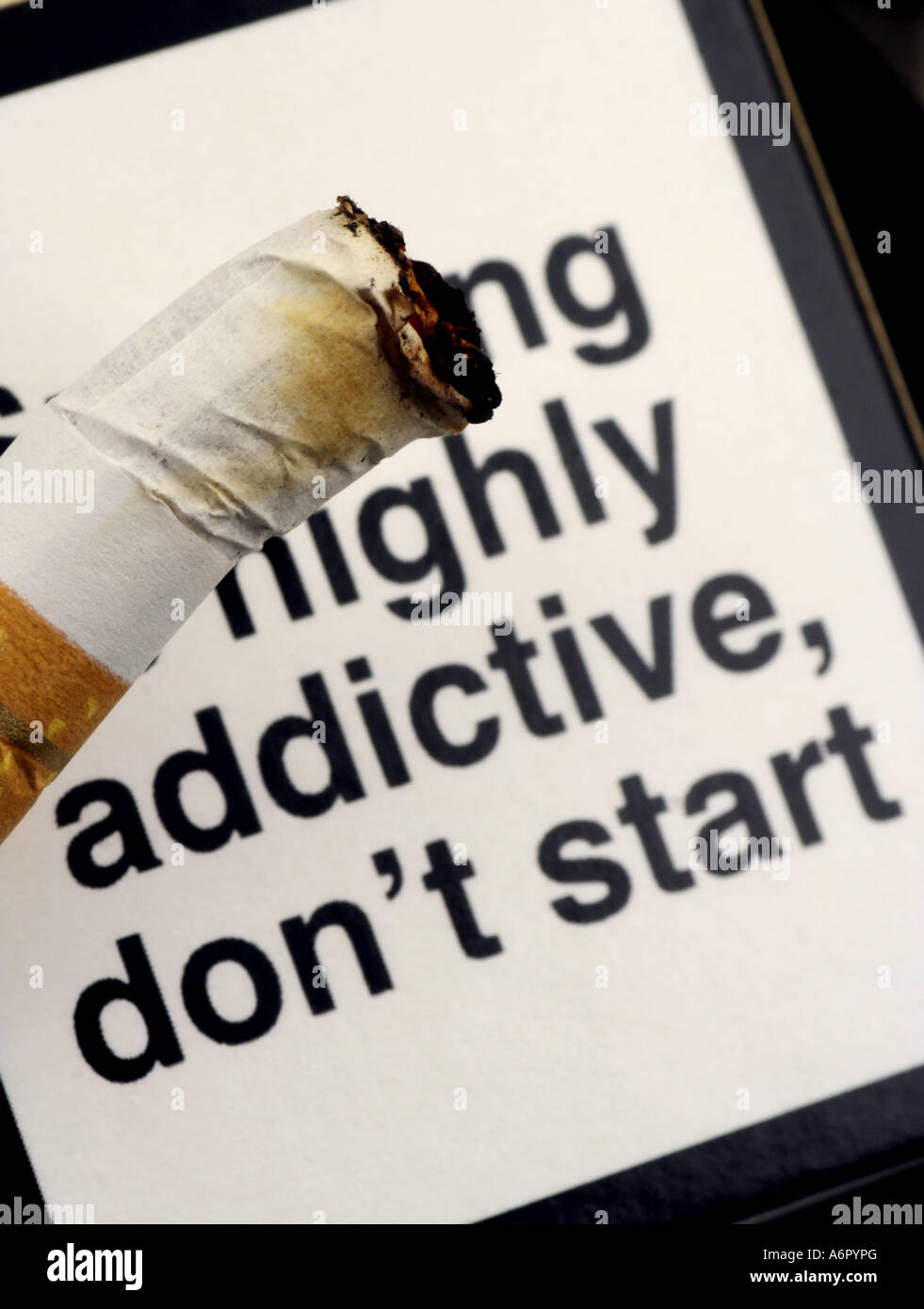 Cigarette and packet health warning Stock Photo - Alamy