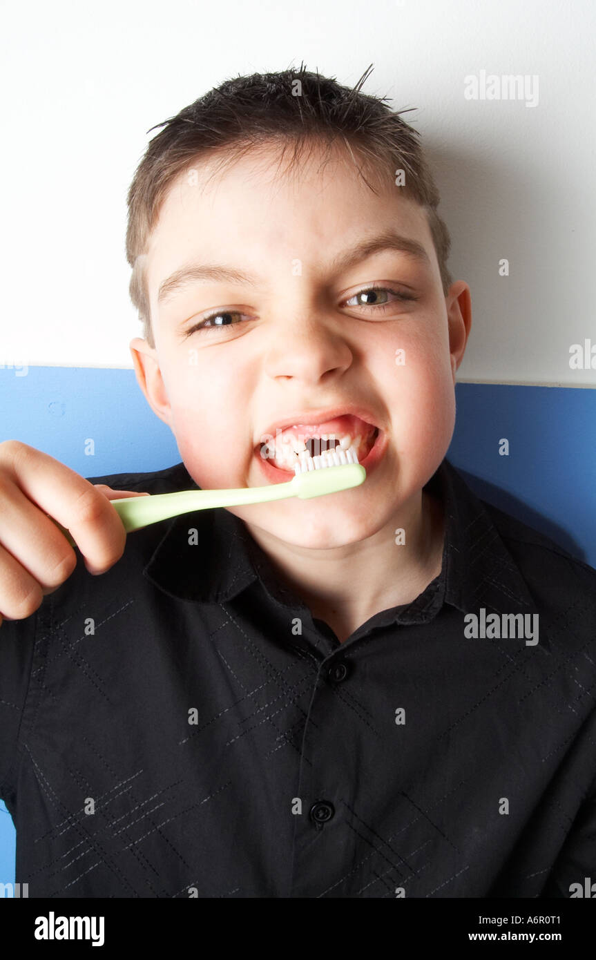 young, boy, with, missing, teeth, brushing, his, teeth, child, clean ...