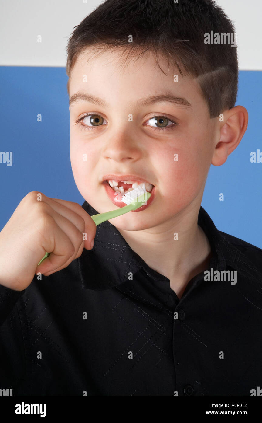 young, boy, with, missing, teeth, brushing, his, teeth, child, clean ...