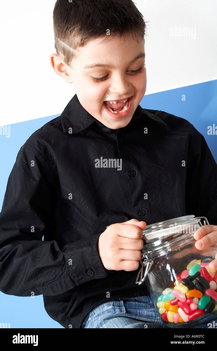 Young, boy, child, kid, eating, jelly beans, sweets, sweeties, candy ...