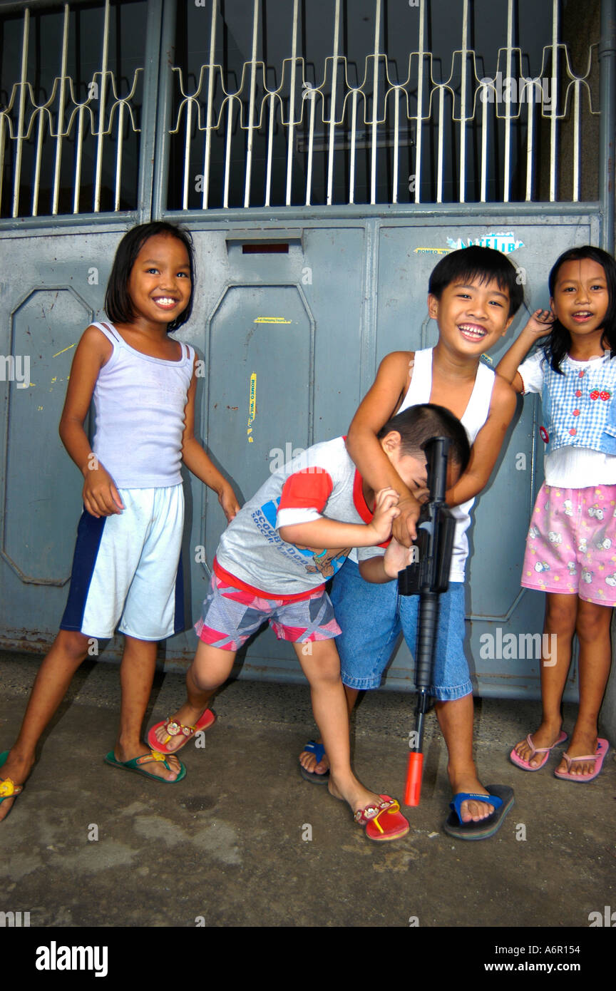 Children playing in street Stock Photo - Alamy
