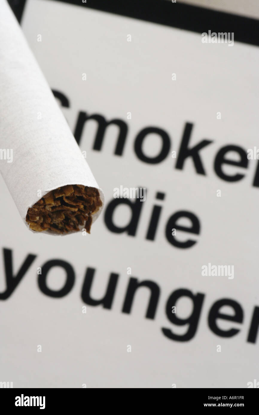 Cigarette and health warning Stock Photo - Alamy