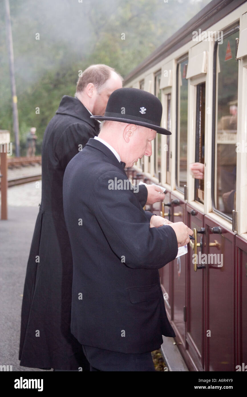 Train guard at Tan y Bwlch station on a Victorian weekend at the ...