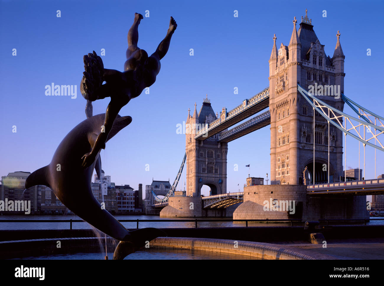 Tower Bridge and Girl with a Dolphin Statue London Stock Photo - Alamy