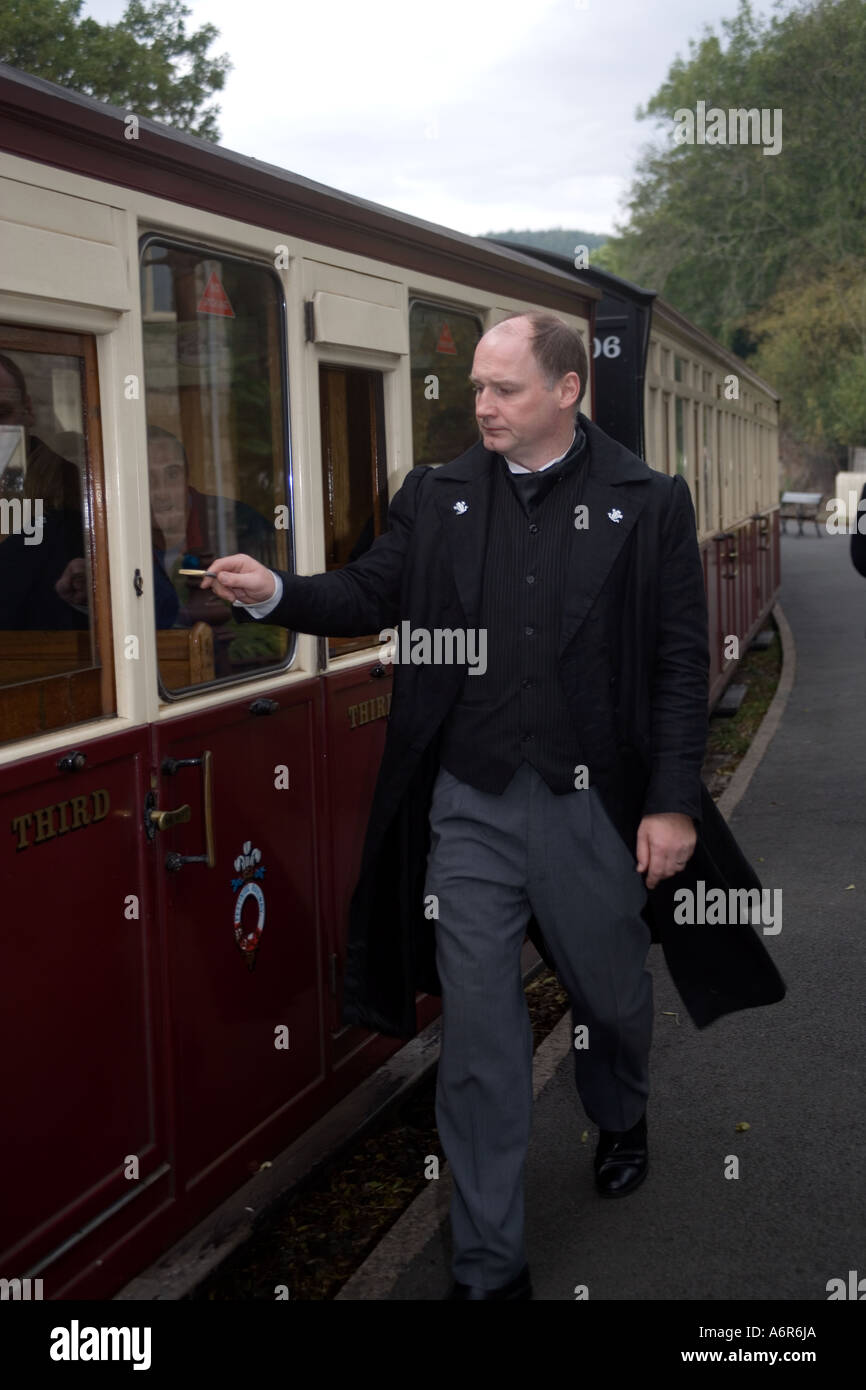Train guard at Tan y Bwlch station on a Victorian weekend at the ...