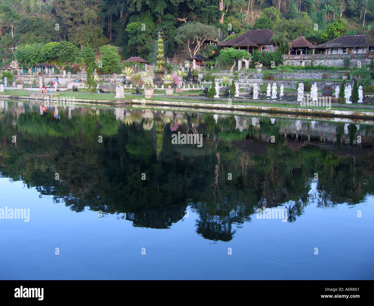 Morning at Tirta Gangga Royal Bathing Pools in East Bali in Indonesia ...