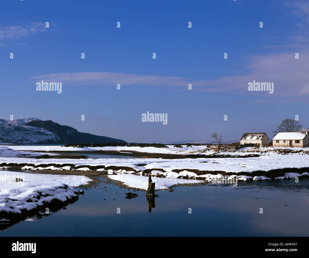The Glenmore River estuary with snow on the ground in late winter ...